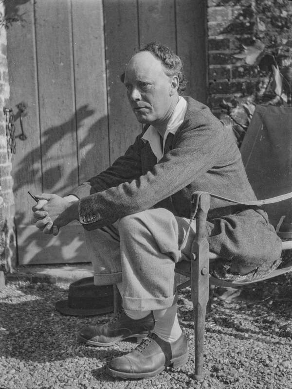 Black and white negative of Clive Bell seated on the terrace in the ...