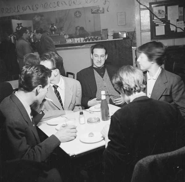 Photograph of jazz musicians at a table, including Tony Crombie‘, Nigel ...