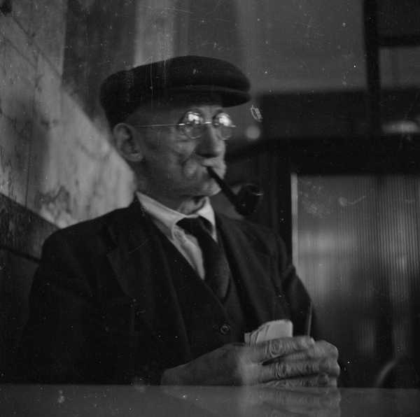 Photograph showing an elderly man smoking a pipe‘, Nigel Henderson, [c ...