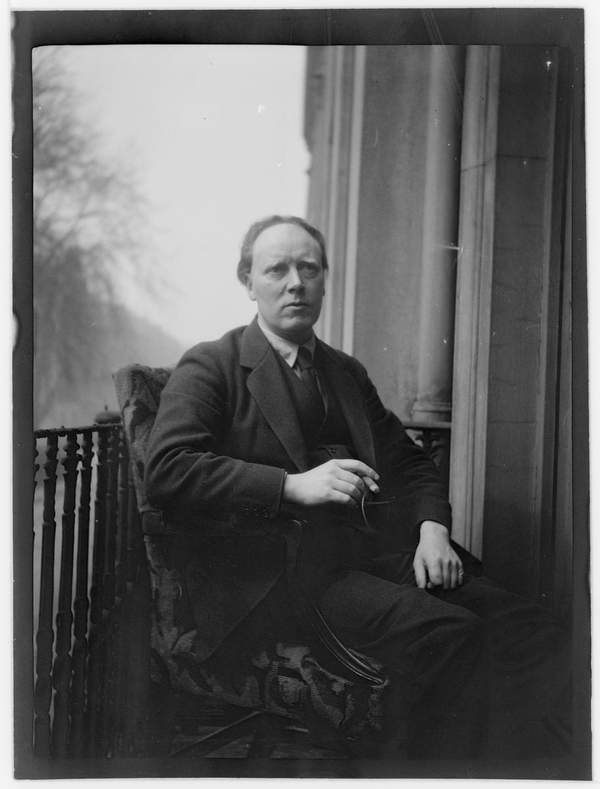 Black and white negative of Clive Bell seated on the balcony at 46 ...