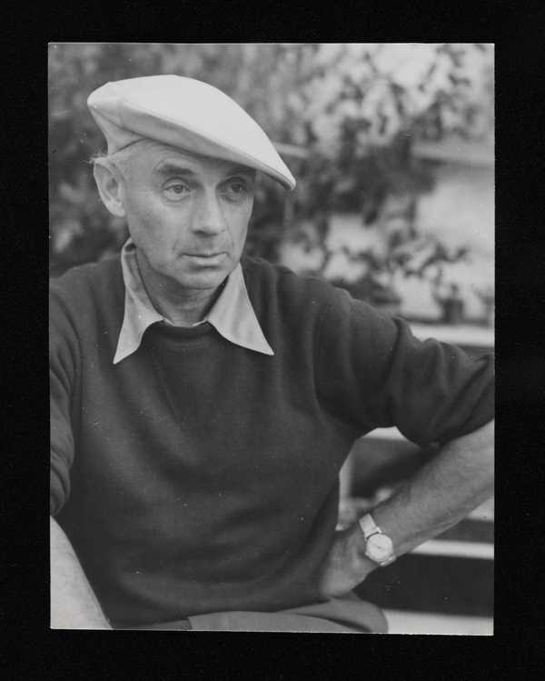 Photographs of Ben Nicholson wearing a cap with his hand on his hip ...