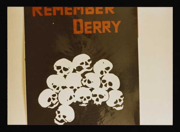 Colour photograph of a poster depicting skulls and the caption ...