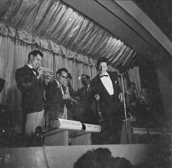 Photograph showing jazz musicians performing, including Ronnie Scott ...