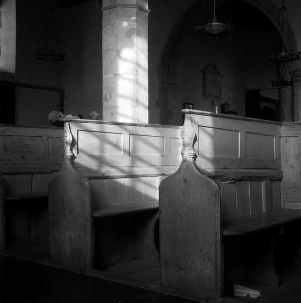 Photograph of the pews and interior at All Saints Church in Graveney ...