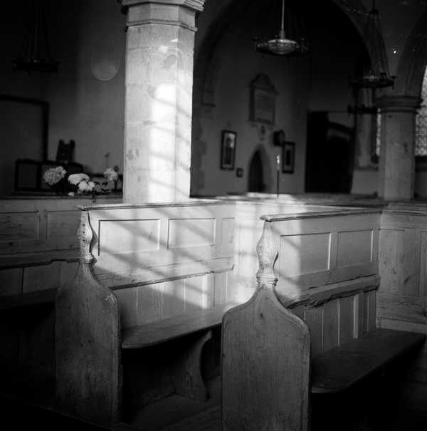 Photograph of the pews and interior at All Saints Church in Graveney ...