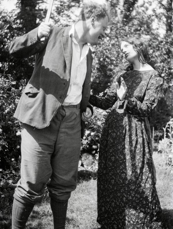 Black and white negative of Quentin Bell and Angelica Bell acting out a ...