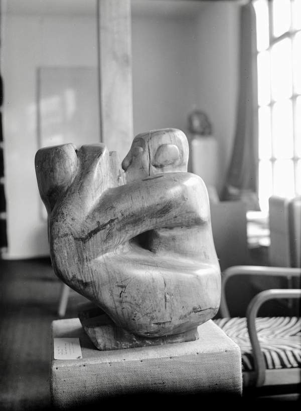 Black and white negative of a close up of a sculpture in a room at ...