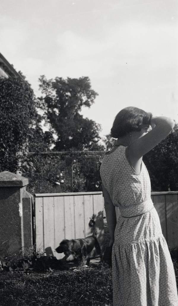 Black and white negative of Frances Marshall looking into the distance ...