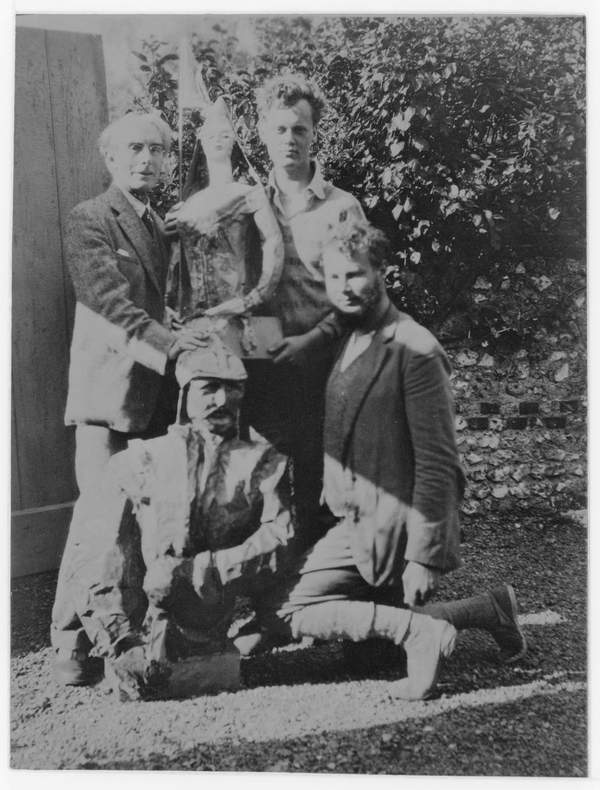 Black and white negative of Julian and Quentin Bell with Roger Fry, standing next to Quentin’s ...