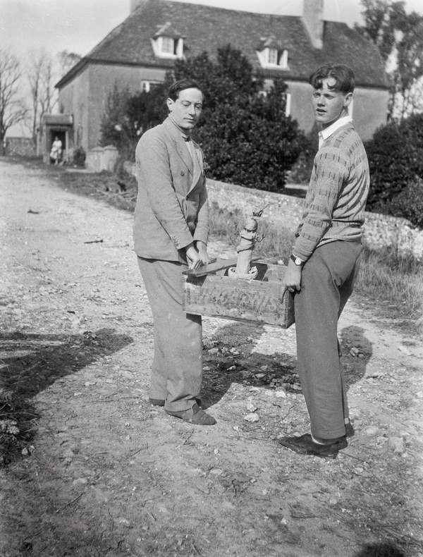 Black and white negative of Duncan Grant and Quentin Bell carrying ...