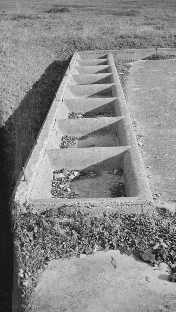 Black and white negative, a concrete trough in a field‘, Paul Nash, [c ...