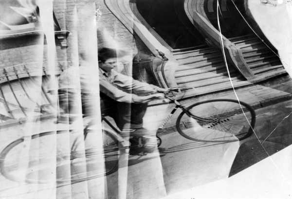 Glass negative of stressed photograph showing a boy on a bike ‘doodling ...
