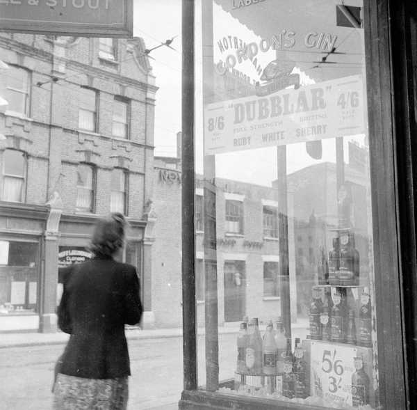 Photograph showing a shop window display selling alcohol‘, Nigel ...