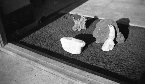 Black and white negative, still life flints on a doormat‘, Paul Nash ...