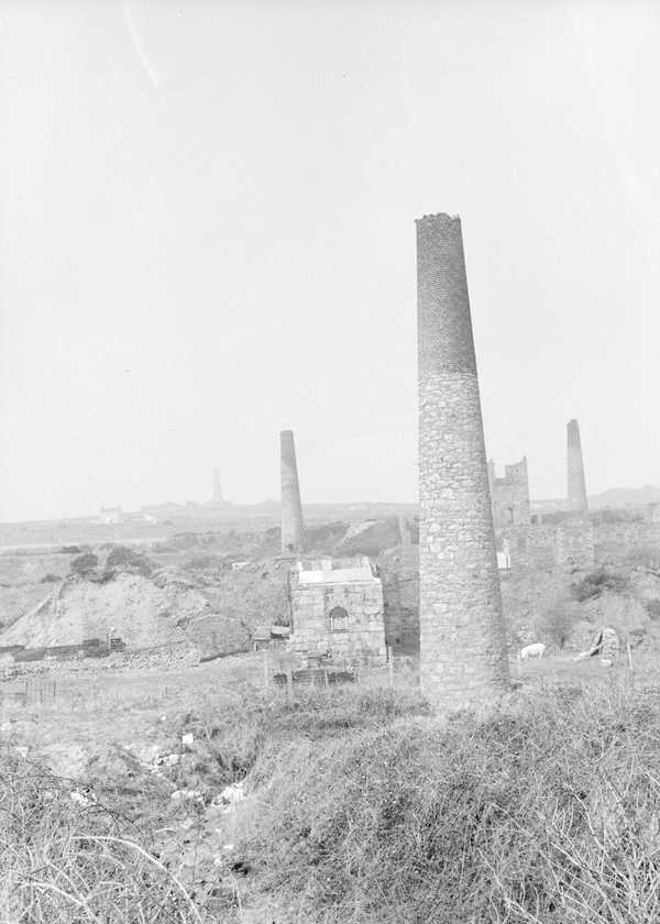 Photograph of West Basset Mine, with Carn Brea behind, near Redruth ...