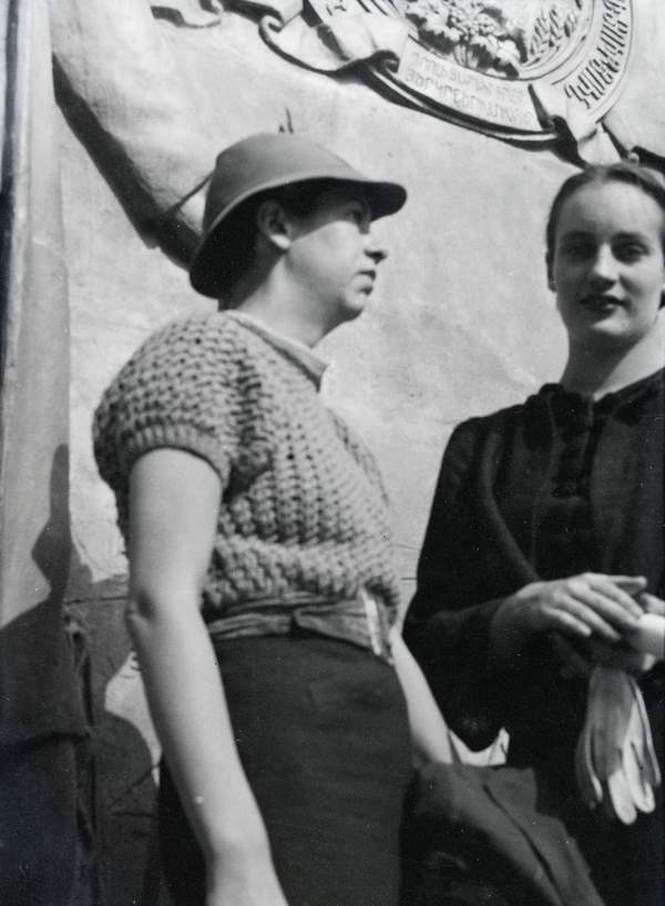 Black and white negative of Janie Bussy with Angelica Bell standing ...