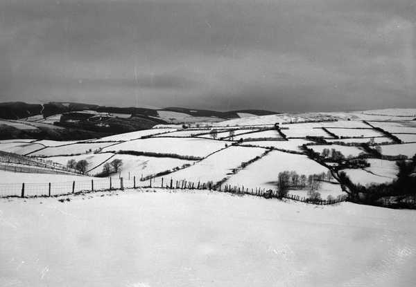 Photograph of a countryside landscape with snow taken between ...