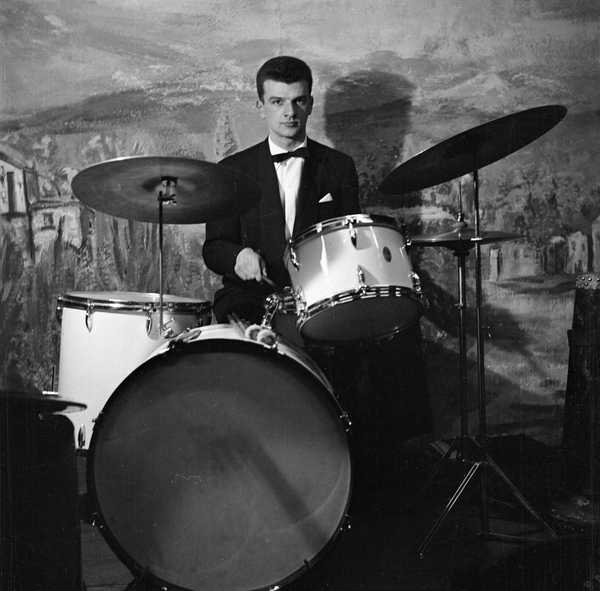 Photograph showing unidentified jazz musician, performing on drums ...