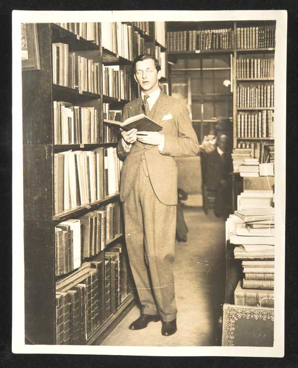 Photograph of Edward Gathorne-Hardy in a library or book shop‘, John ...