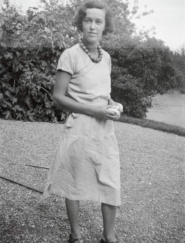 Black and white negative of Frances Marshall standing outdoors at ...