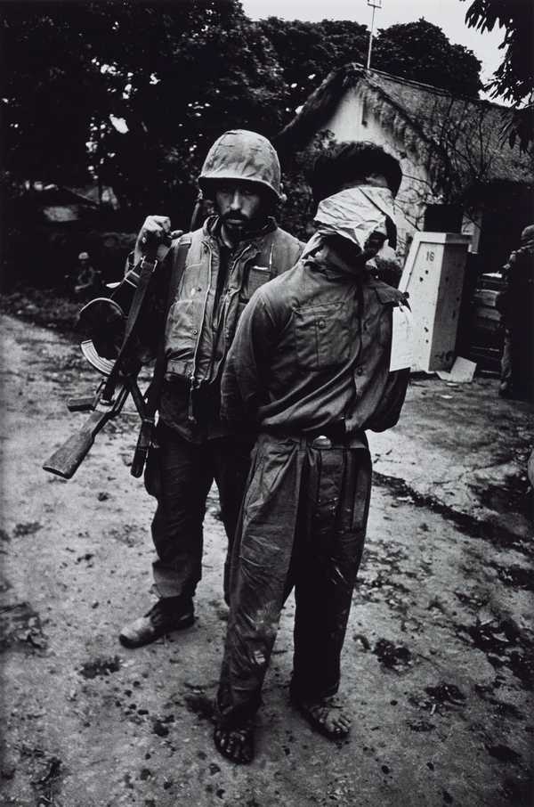 ‘US Marine with a Captured North Vietnamese Soldier, The Battle of Hue ...