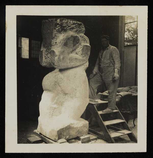 Photograph of Jacob Epstein with his sculpture ‘Adam’‘, Anonymous, [c ...