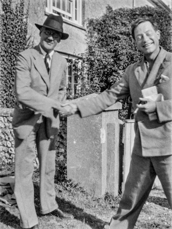 Black and white negative of Oliver Strachey and Duncan Grant, shaking ...