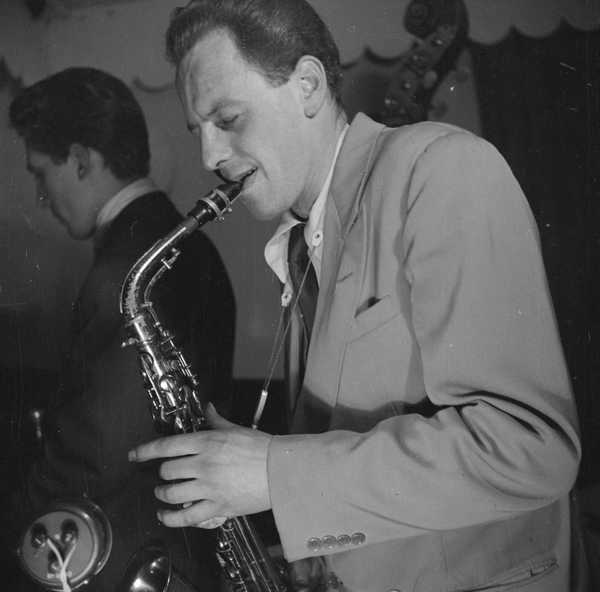 Photograph showing unidentified jazz musician, performing on saxophone ...