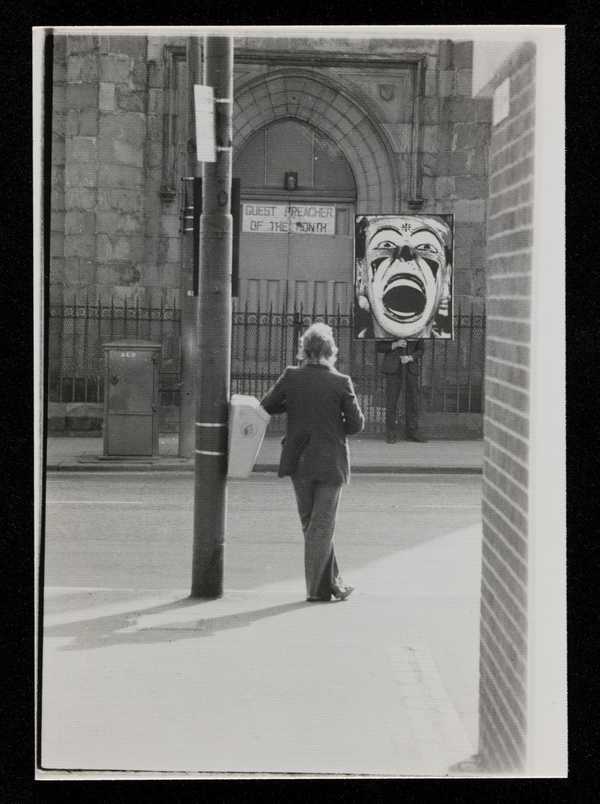 Black and white photograph of Dougie Thomson holding a large clown ...