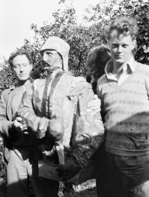 Black and white negative of Duncan Grant and Quentin Bell standing next ...