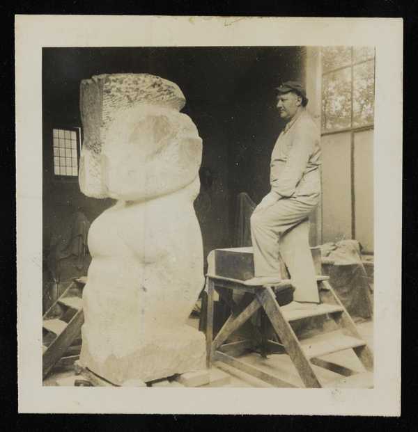 Photograph of Jacob Epstein with his sculpture ‘Adam’‘, Anonymous, [c ...