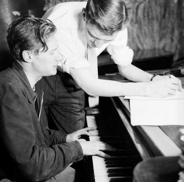 Photograph of an unidentified man performing on piano with Jack Parnell ...
