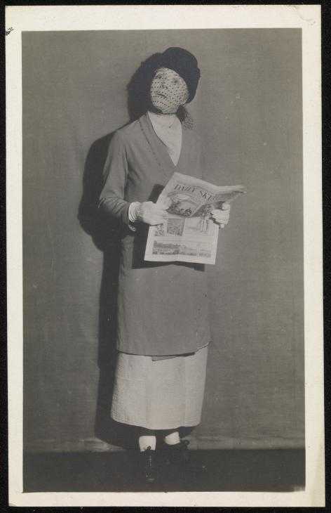 Photograph of [Lady Constance Foljambe] in costume holding a newspaper ...