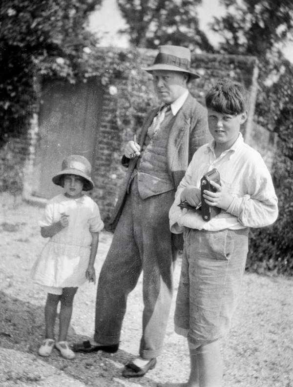 Black and white negative of Angelica and Clive Bell standing with ...