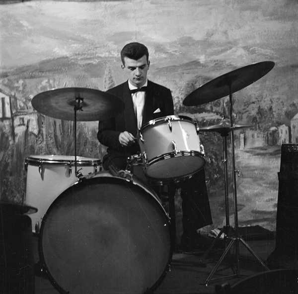 Photograph showing unidentified jazz musician, performing on drums ...