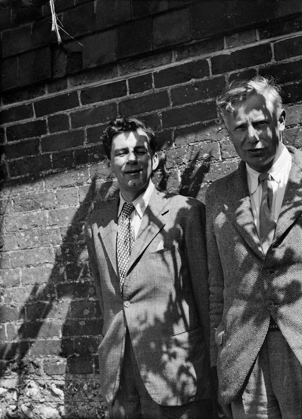 Black and white negative of Raymond Mortimer and David Garnett in front ...