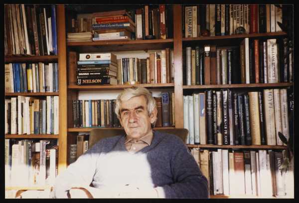 Photograph of ‘Irish Times’ art critic Brian Fallon sitting in front of ...