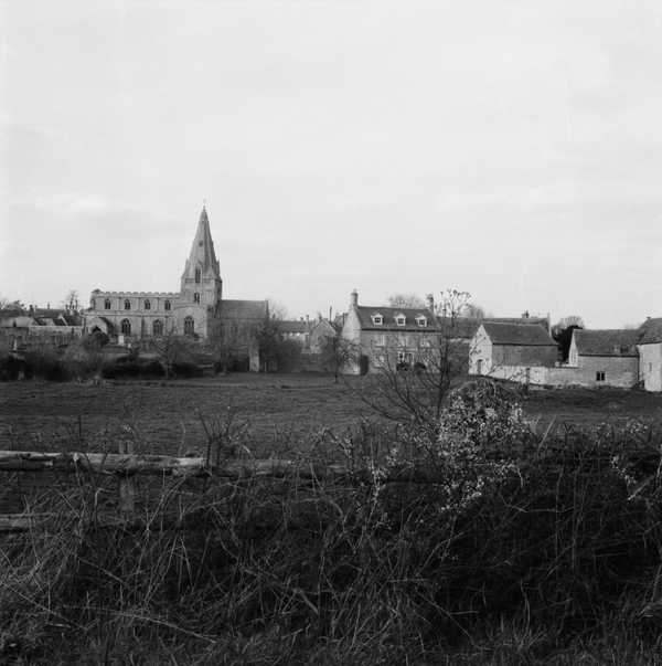 Photograph of All Saints Church and surrounding houses in King’s Cliffe ...