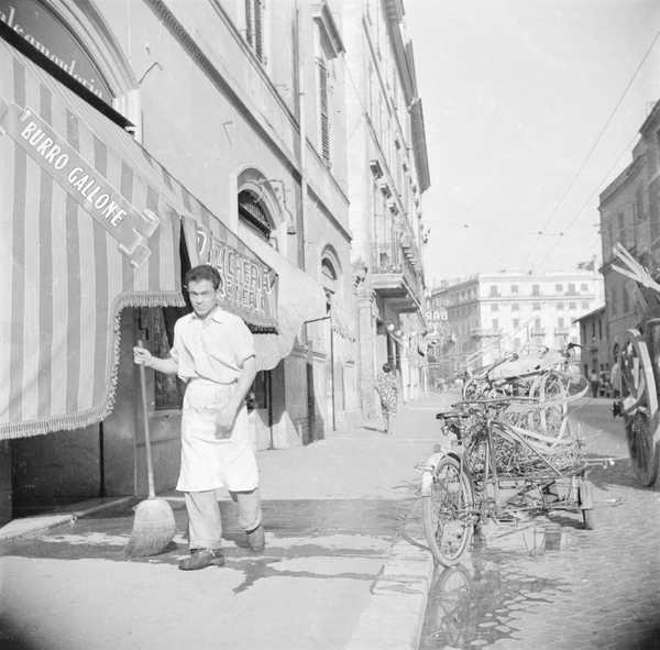 Photograph of an unidentified man sweeping the pavement‘, Nigel ...