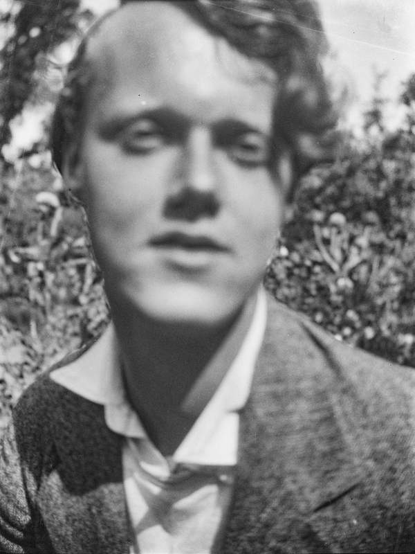 Black and white negative of Quentin Bell close up in the garden at ...