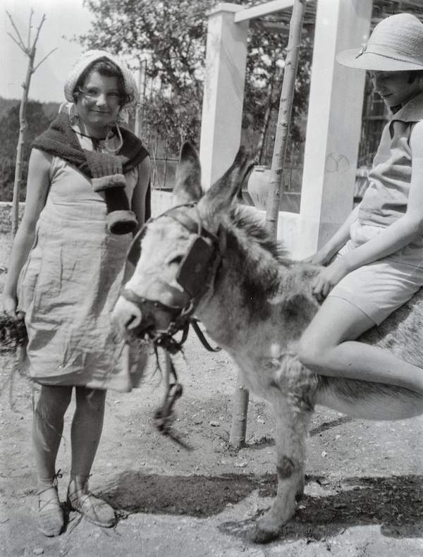 Black and white negative of Judith Bagenal standing next to Angelica ...