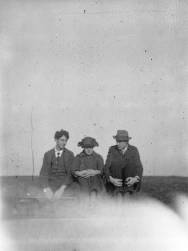 Black and white negative of Adrian Stephen, Virginia Woolf and an unidentified male outdoors ...