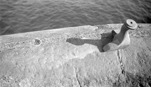 Black and white negative, still life, a chair leg beside water‘, Paul ...