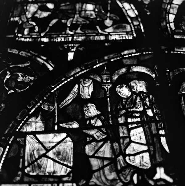 Photograph of detail of a stained glass window at Canterbury Cathedral ...